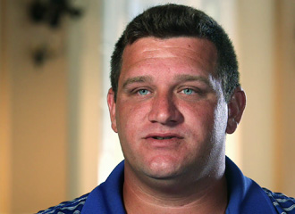 A son helps his father decades after combat